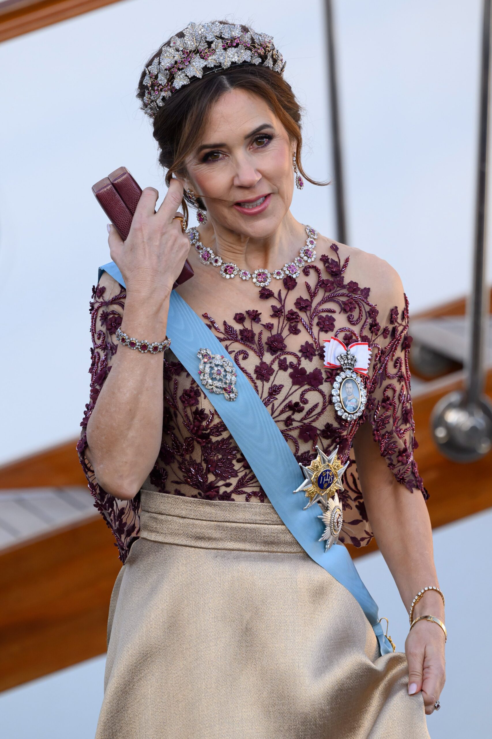 Queen Mary of Denmark leaves the royal yacht for a state banquet at the ...